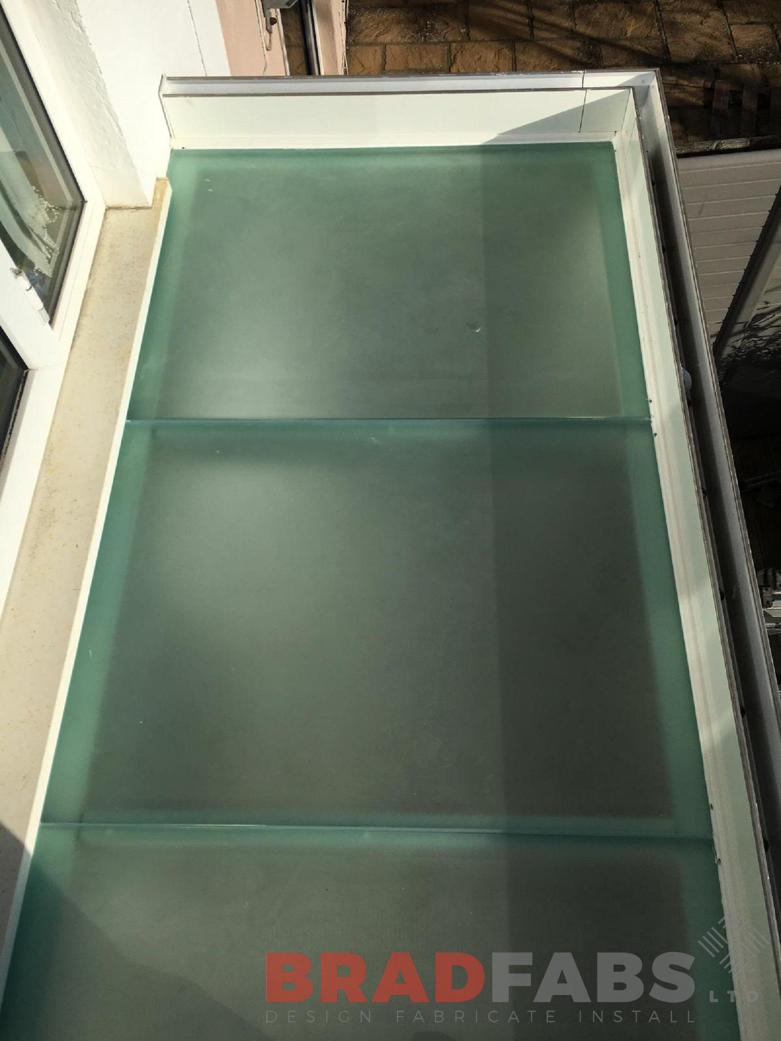 Balcony with glass floor panel, bespoke by bradfabs ltd