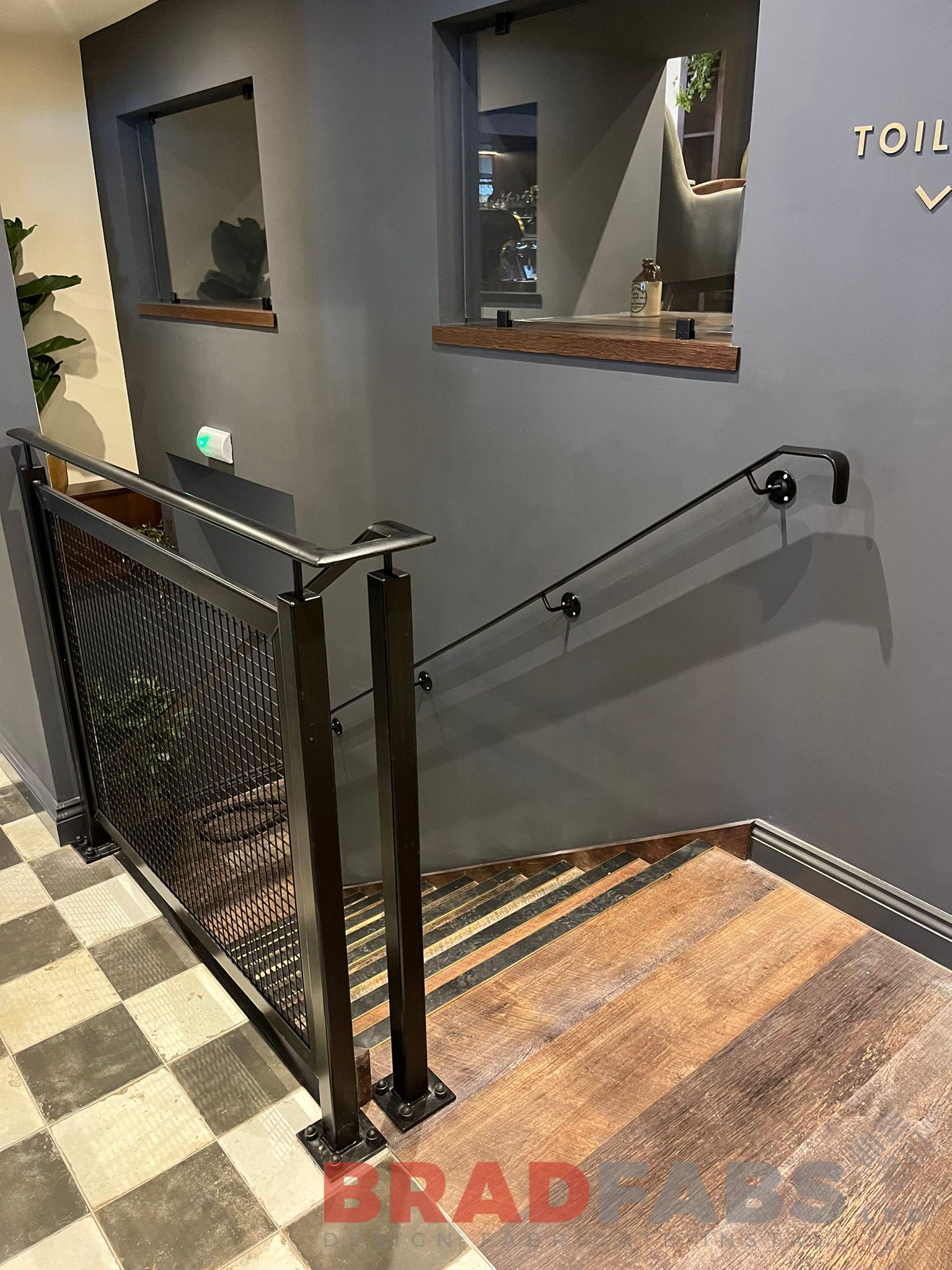 Stunning black handrail and railings for a hotel in Wales by Bradfabs